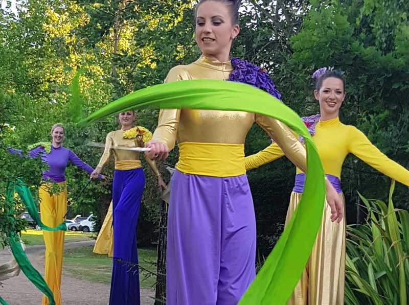 Colour Walkabout Performers For Hire | Roaming Stilt Artists | Coloured ...
